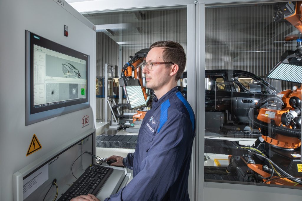 AI-Controlled Robots Process Individual Vehicle Paint Quality Standards ...